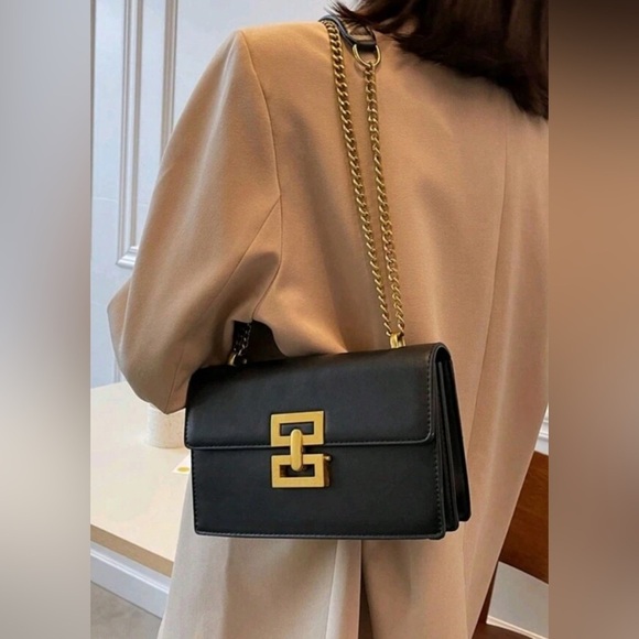 Bags | Black Purse With Gold Chain Strap And Emblem Clasp On Front ...